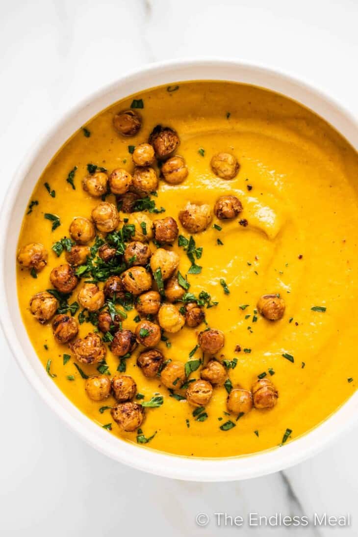 Creamy Roasted Carrot Soup with Crispy Chickpea Croutons