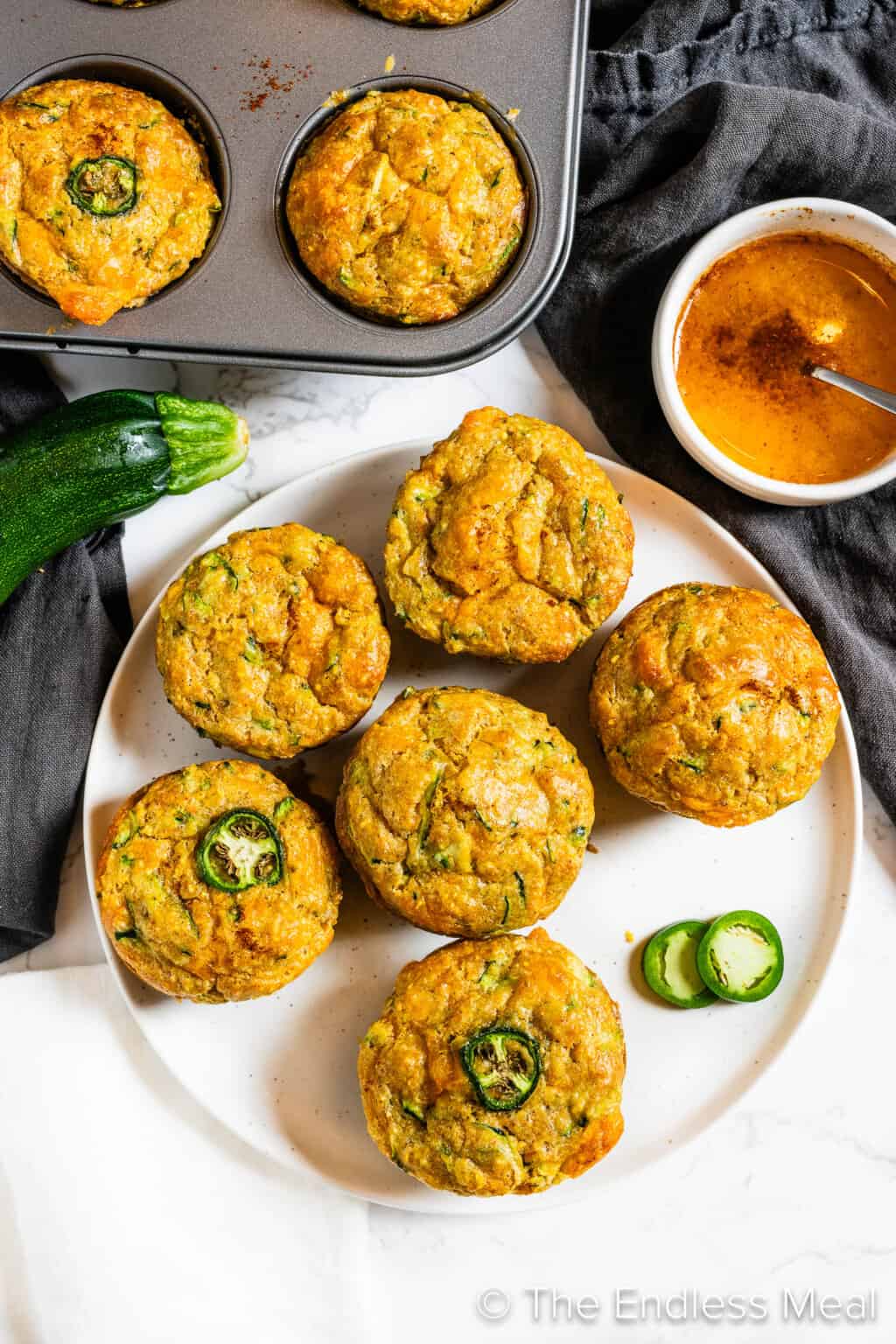 Zucchini Cornbread Muffins with Chili Honey Butter