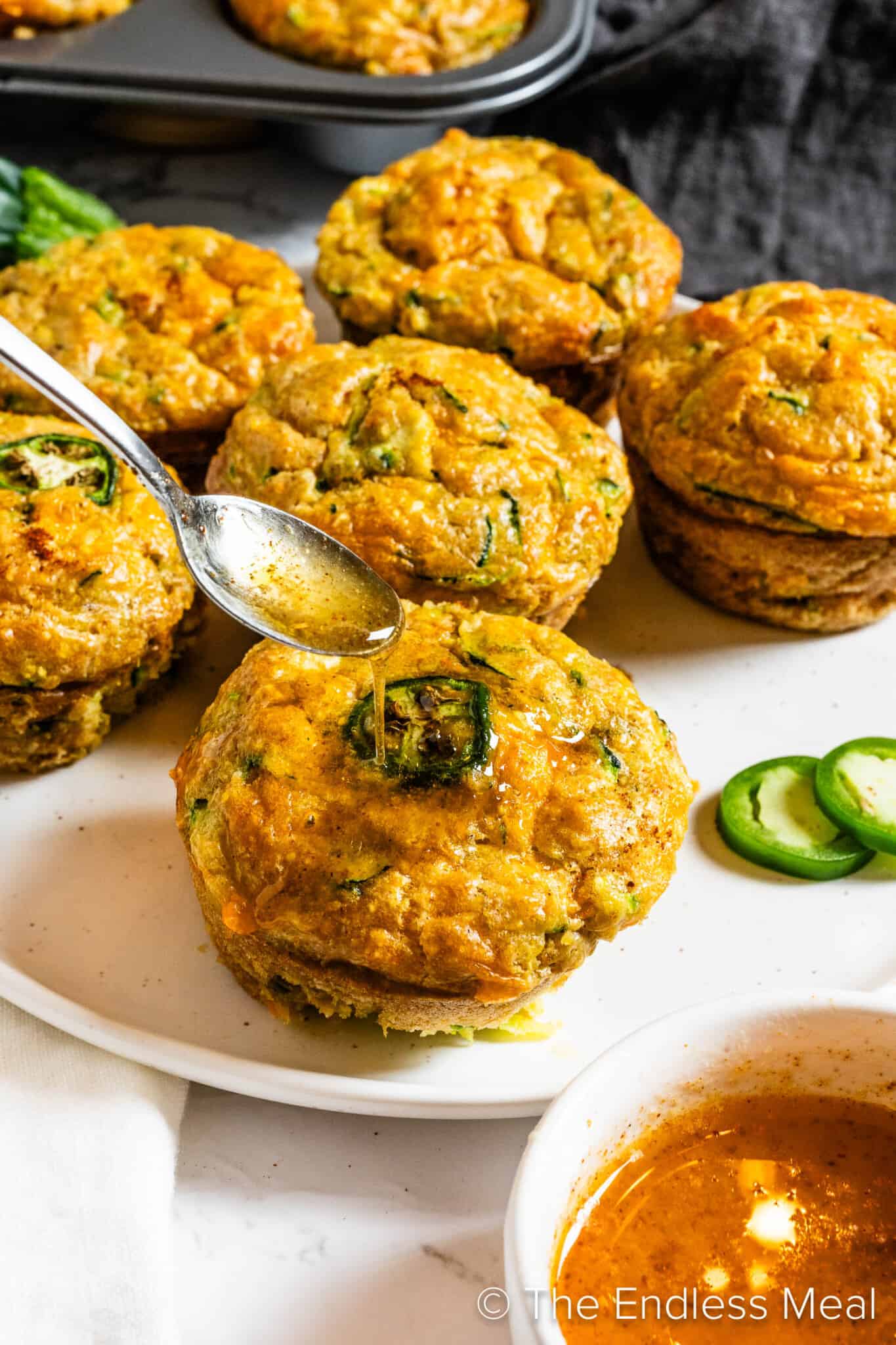 Zucchini Cornbread Muffins with Chili Honey Butter